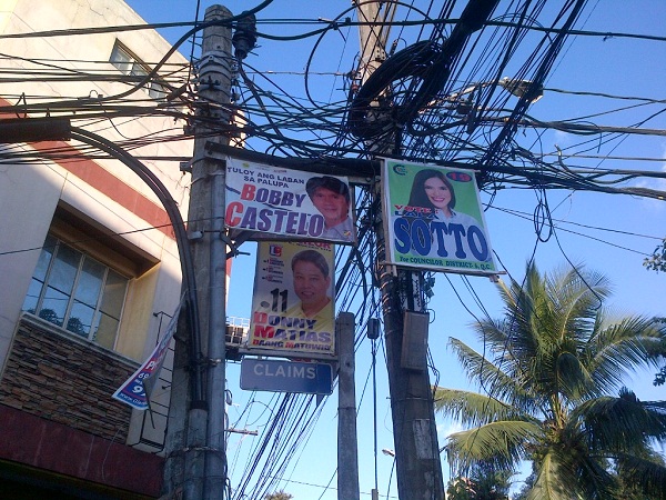QC bets ‘flood’ area with poll posters | Inquirer News