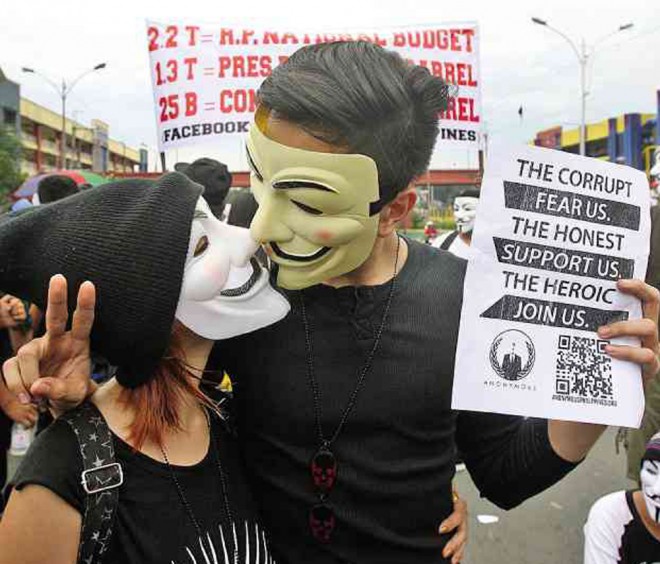 Masked protesters vow more I-attacks | Inquirer News