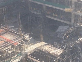 2 dead, 11 hurt as BGC building floor collapses | Inquirer News