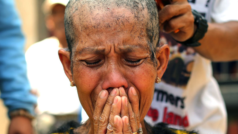 9 women shave heads to protest CARP delay | Inquirer News