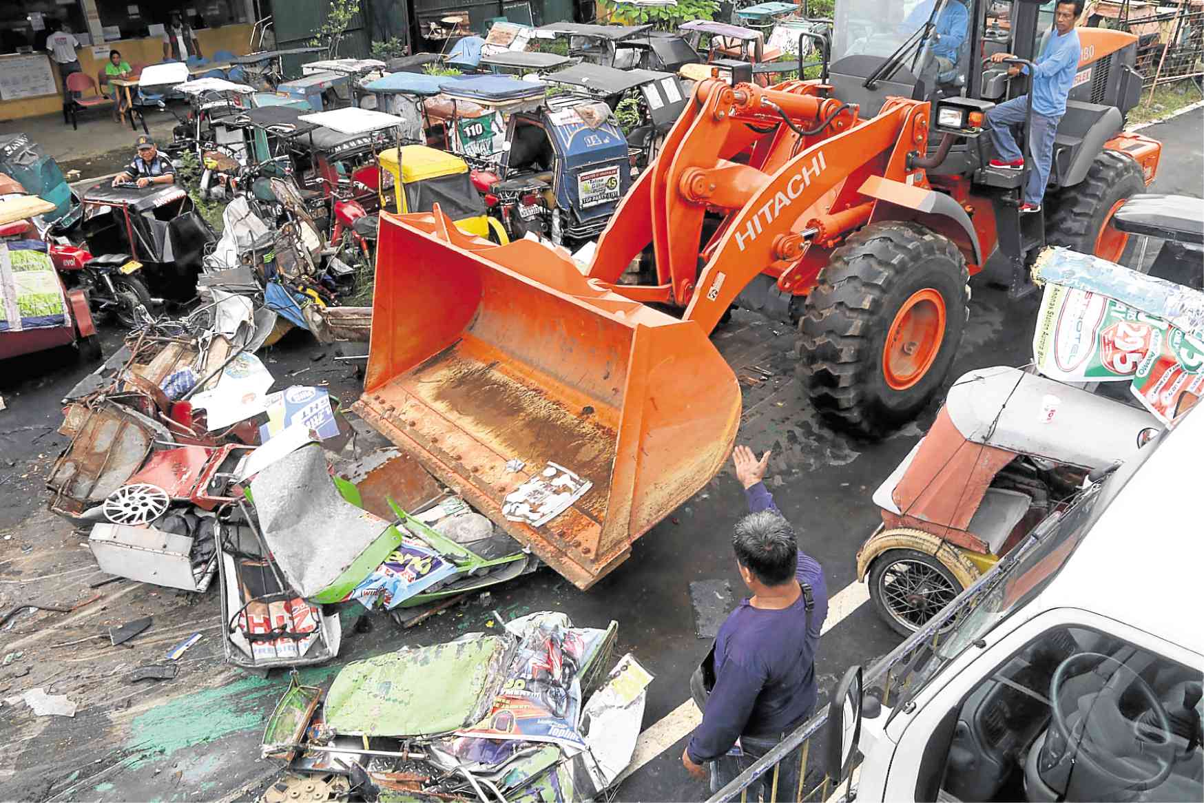 QC gov’t crushes sidecars seized from colorum tricycle drivers ...