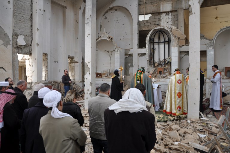 Syria Christians hold first prayer in years in ravaged church ...