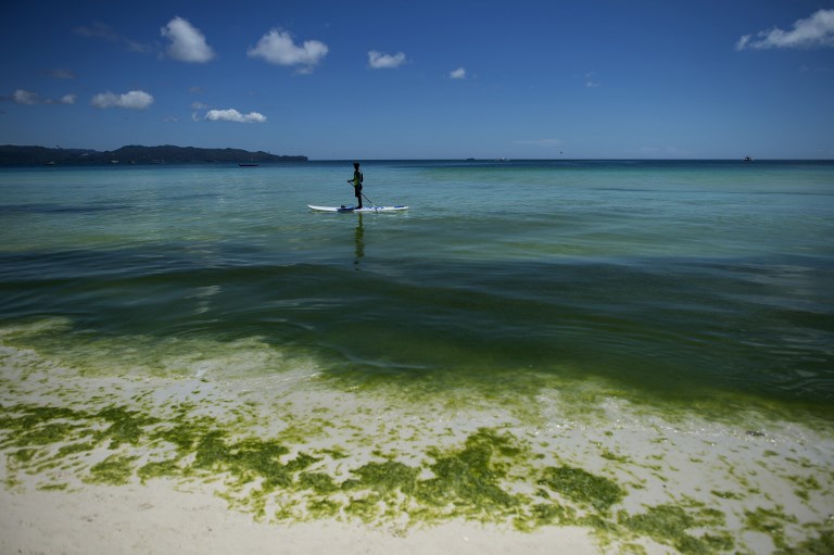 DOT leads gov’t workers, volunteers in Boracay clean-up | Inquirer News