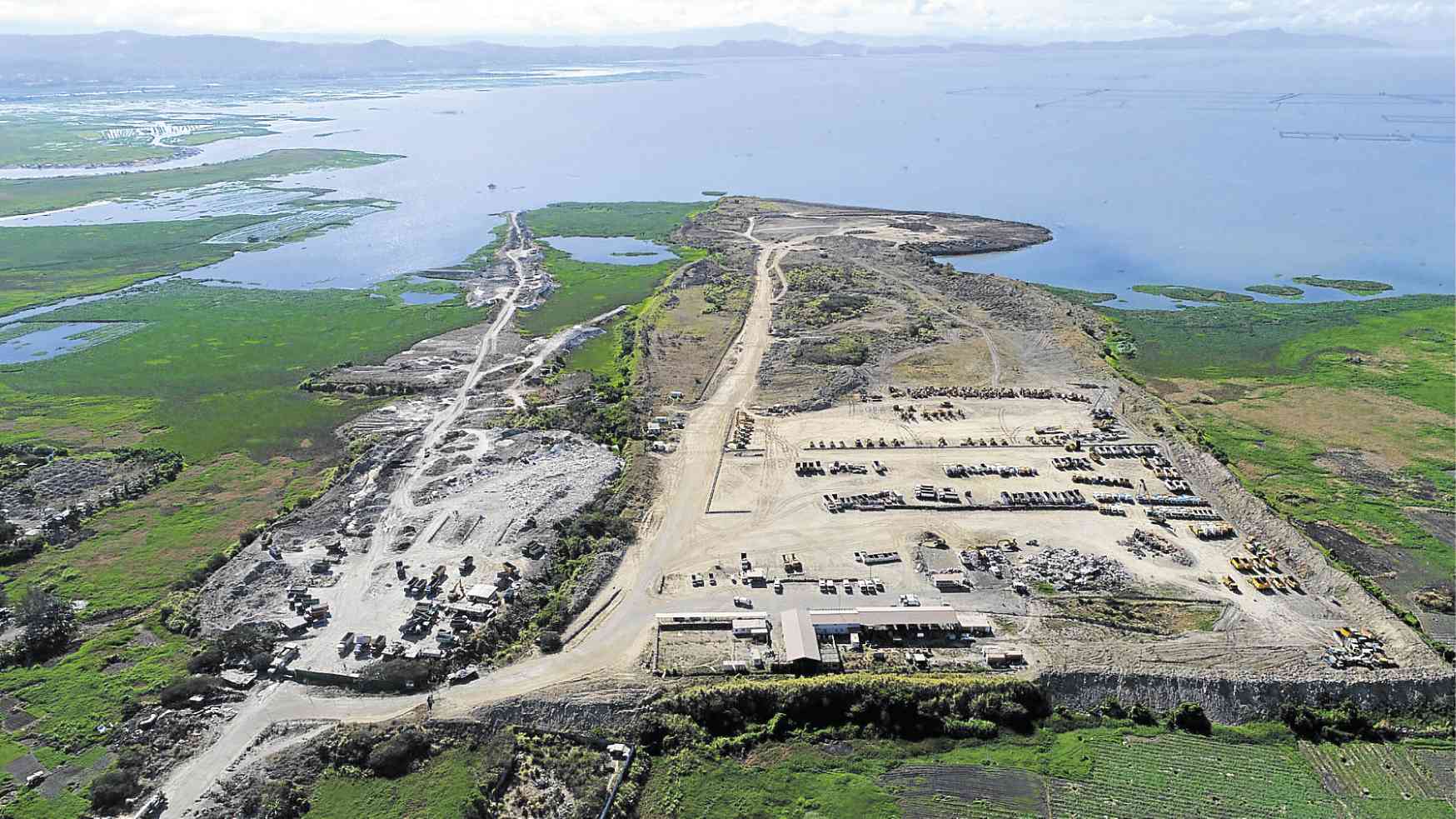 Trash-hauling firms face raps over Laguna Lake reclamation | Inquirer News