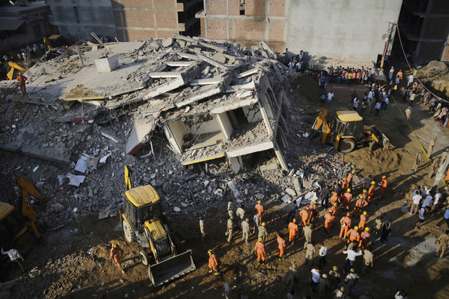 Building collapses into another near Indian capital, 3 die | Inquirer News