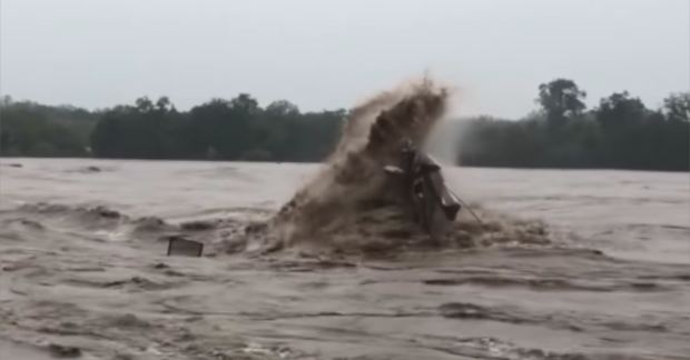 WATCH: Floodwaters carry away debris of collapsed Texas bridge ...