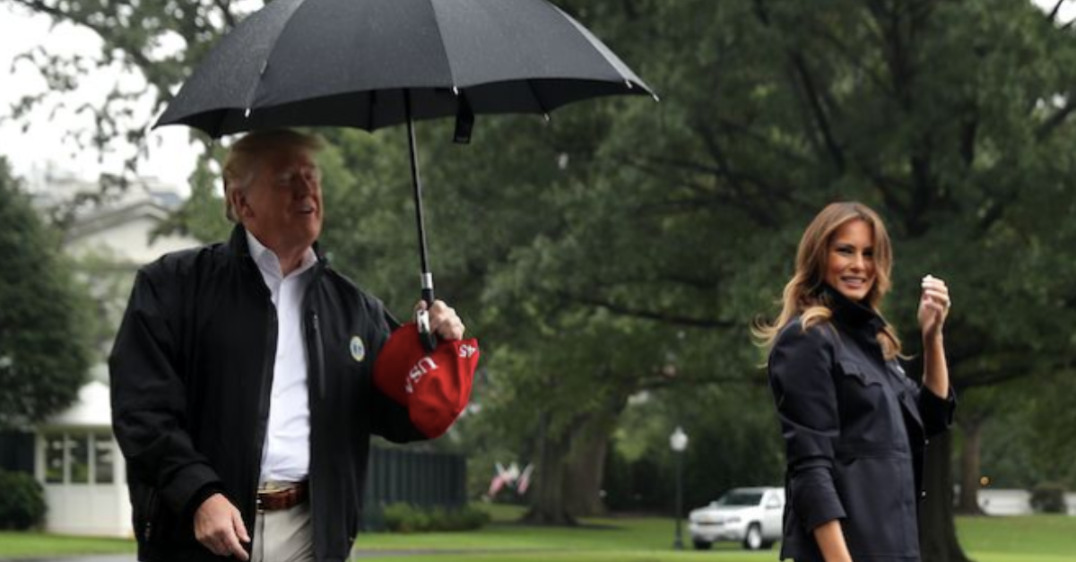 LOOK: Trump won't share umbrella with Melania, rained on by flak anew ...