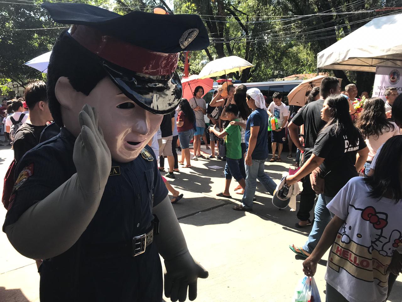 LOOK: PNP mascots spread positive vibe at Manila South Cemetery ...