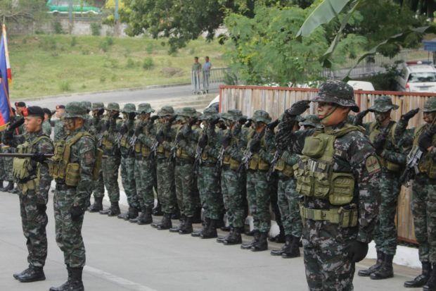 LOOK: PNP officials lay wreath at SAF 44 memorial | Inquirer News