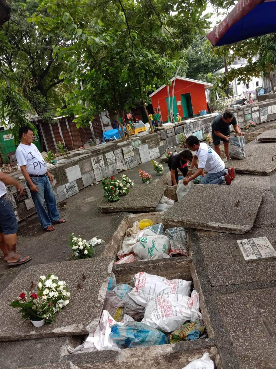Bones, skulls scattered inside Manila North Cemetery given proper ...