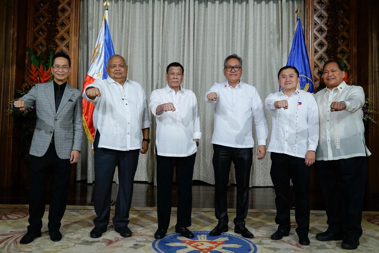 New SC associate justice does a fist bump Duterte-style and draws flak