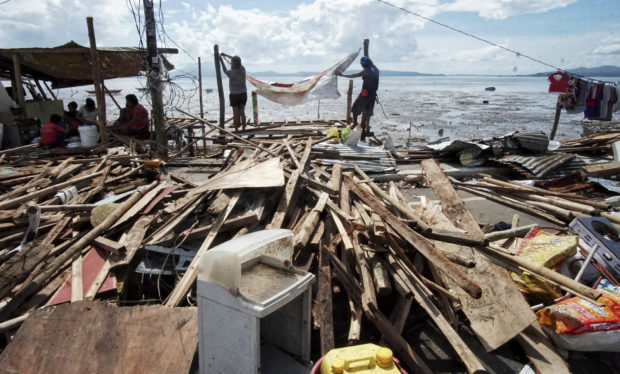 Duterte visits typhoon-hit Bicol as more areas placed under state of ...