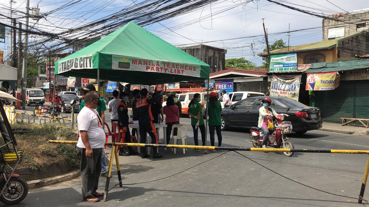 Taguig Police restrict access to C-6 Road after city declared lockdown ...