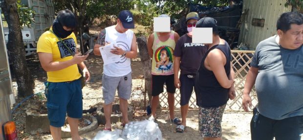 3 held for hoarding, selling overpriced alcohol in Bulacan | Inquirer News