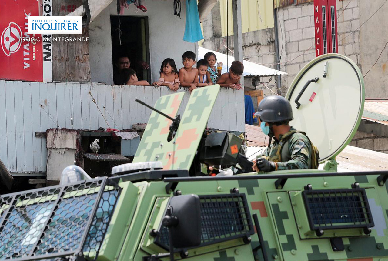 Heavy police presence in Navotas hit | Inquirer News