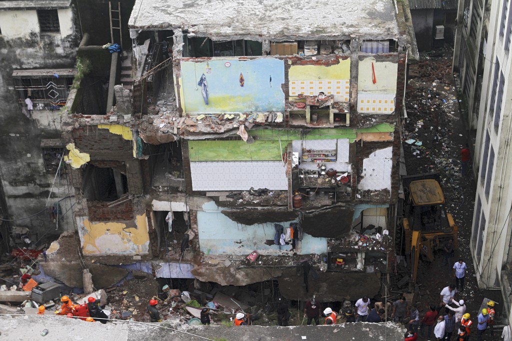 Death toll in India building collapse jumps to 35 | Inquirer News