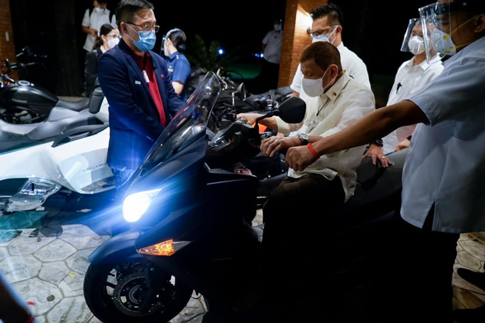 LOOK: Duterte eager to ride motorcycle, mounts one in Malacañang ...