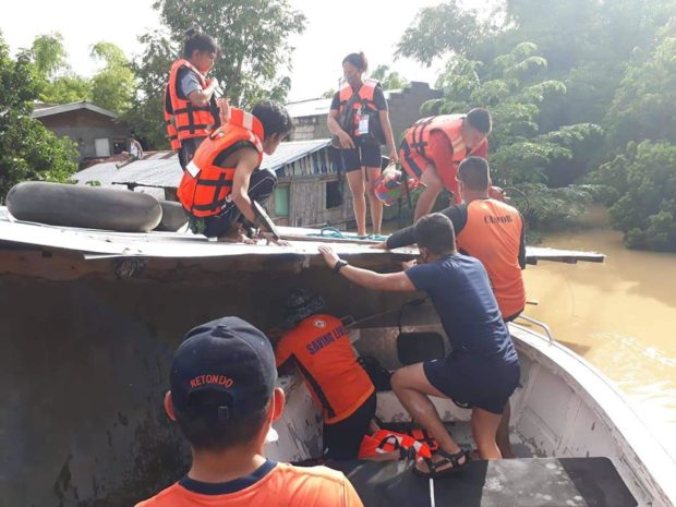 Coast Guard rescues residents in flood-hit Cagayan, Isabela | Inquirer News
