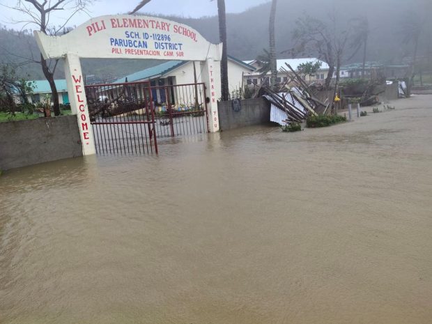 Swollen Camarines Sur river floods 2 villages | Inquirer News