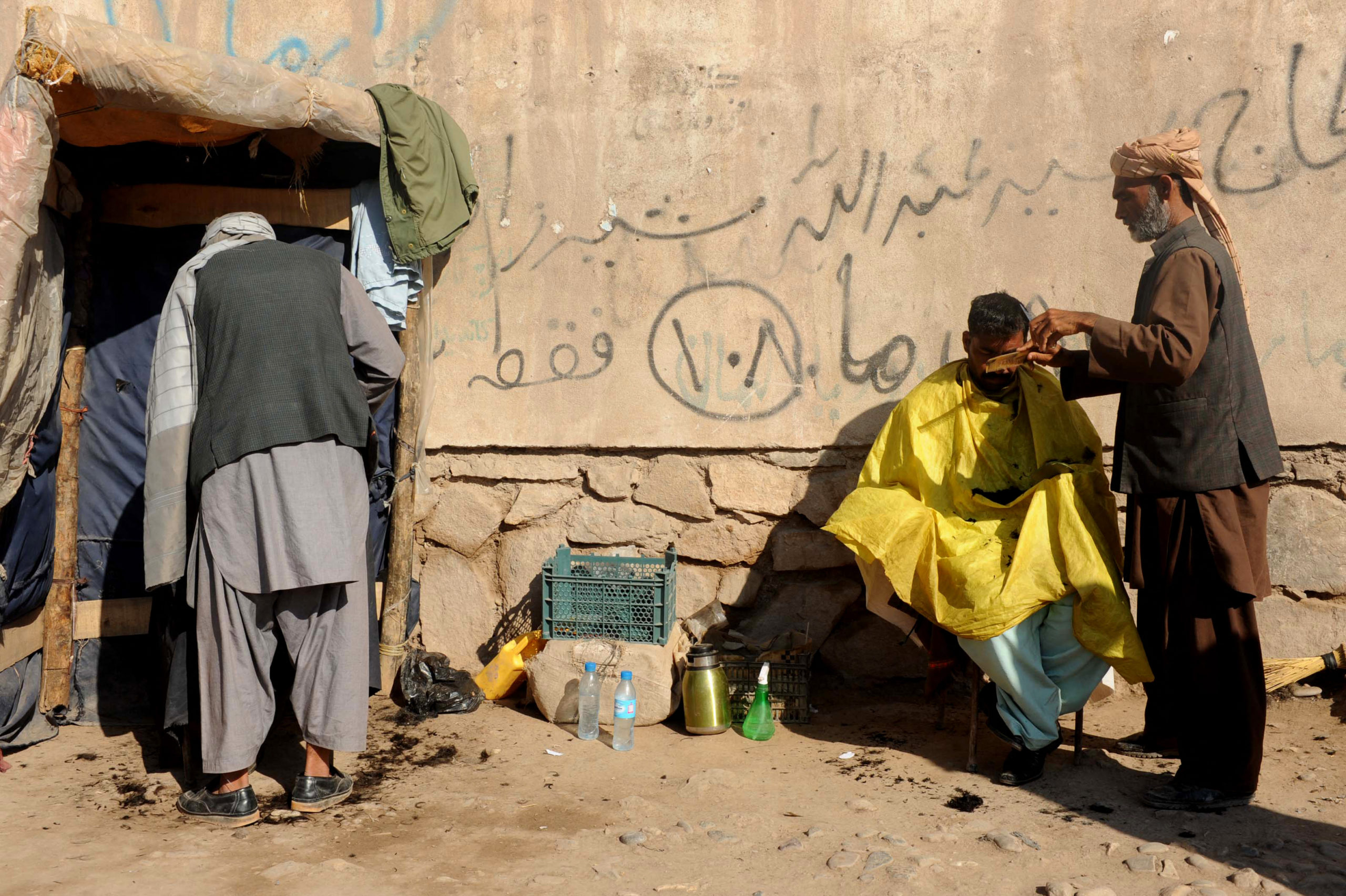 Barbers suffer under Taliban rule as Afghans shun fashion | Inquirer News