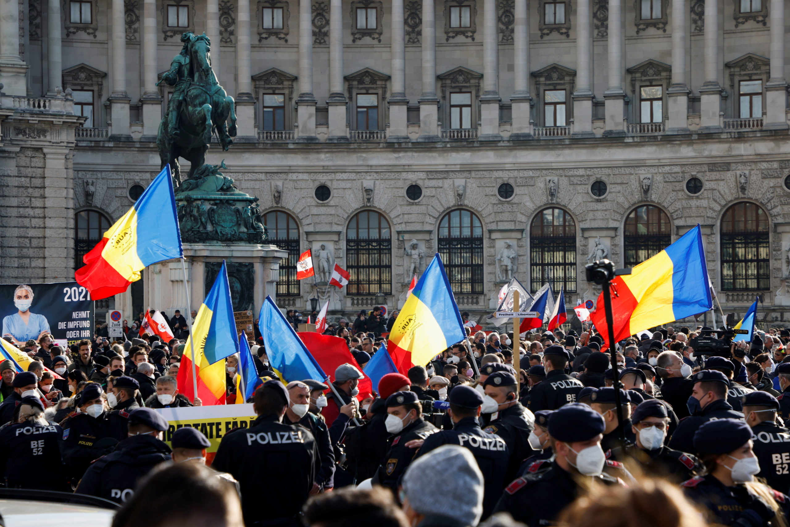Tens of thousands march in Vienna against COVID-19 measures before ...