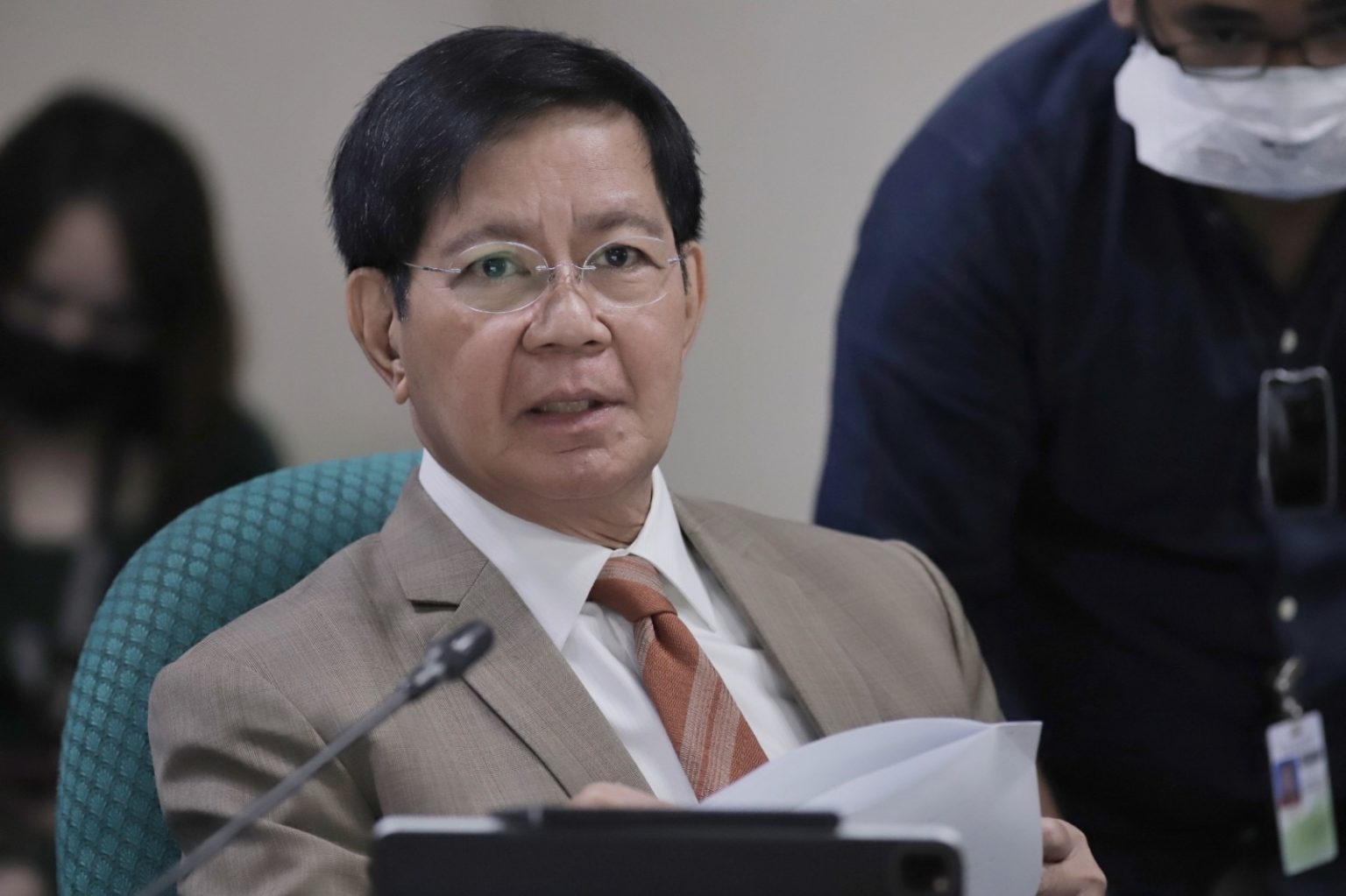Being photographed while giving help makes me cringe, says Lacson ...