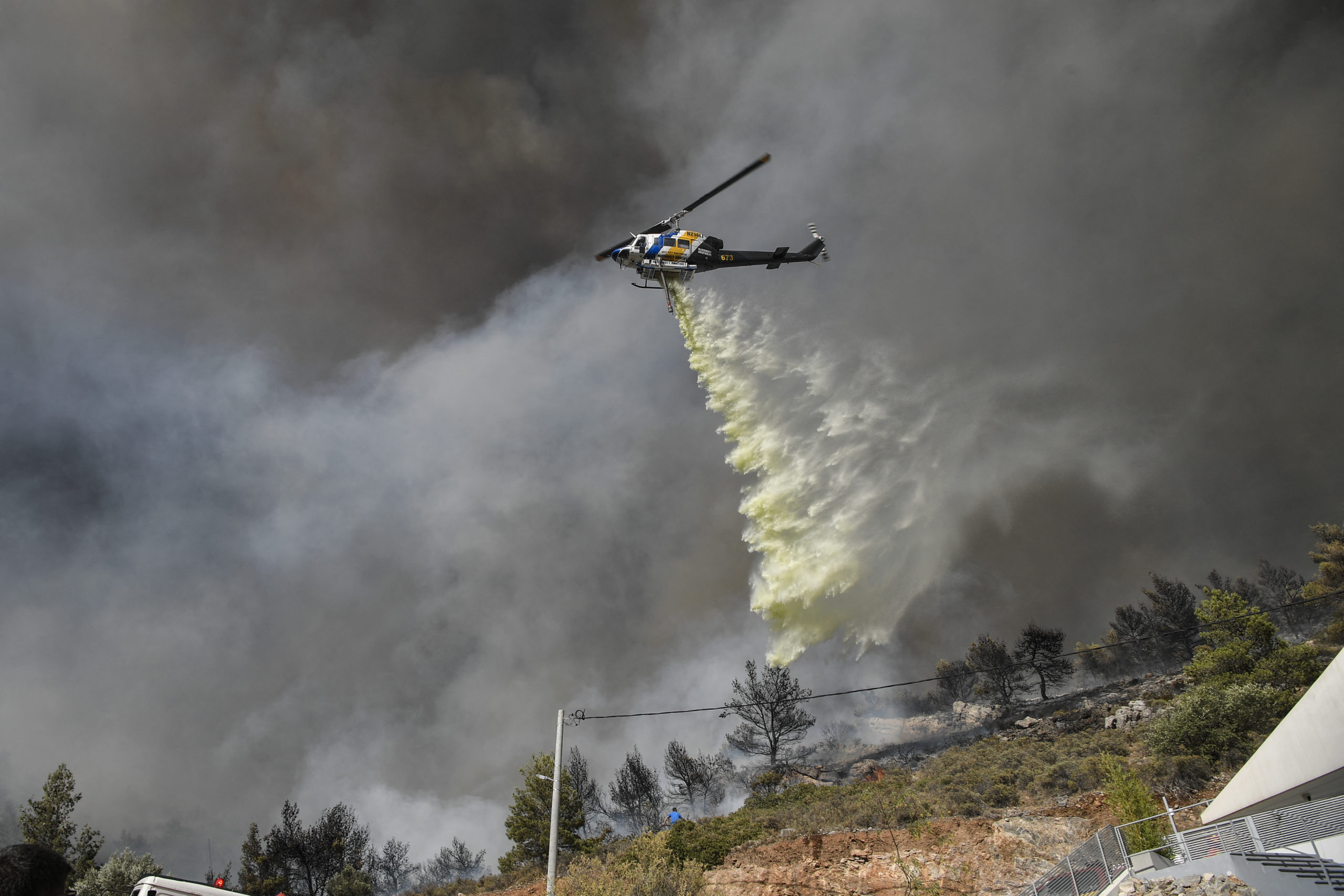 Wildfire rages in Greece’s Evia island, one village evacuated ...