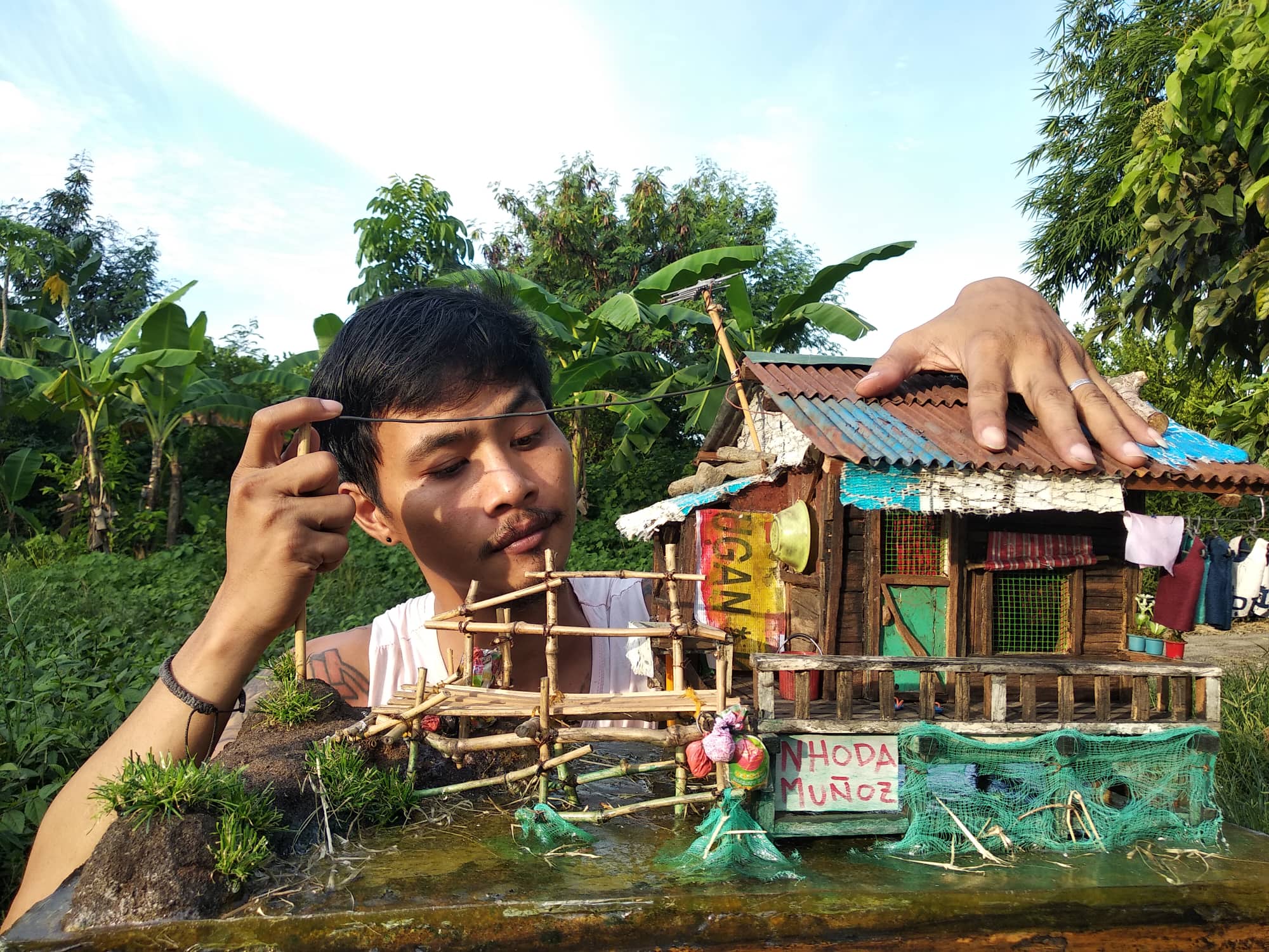Artist in Pampanga wows netizens with miniature scale 'barong-barong ...