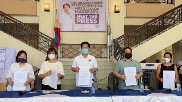 Negrense volunteers, Bacolod City gov't team up for mingo meals program ...