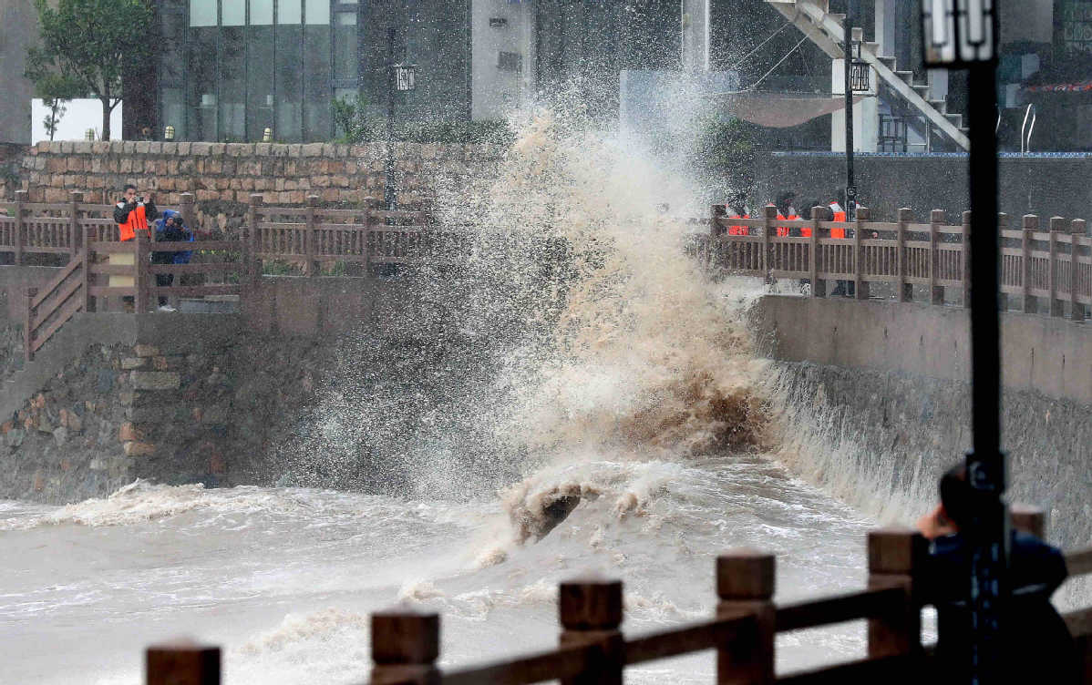 More Chinese cities brace for typhoon as Muifa makes landfall ...