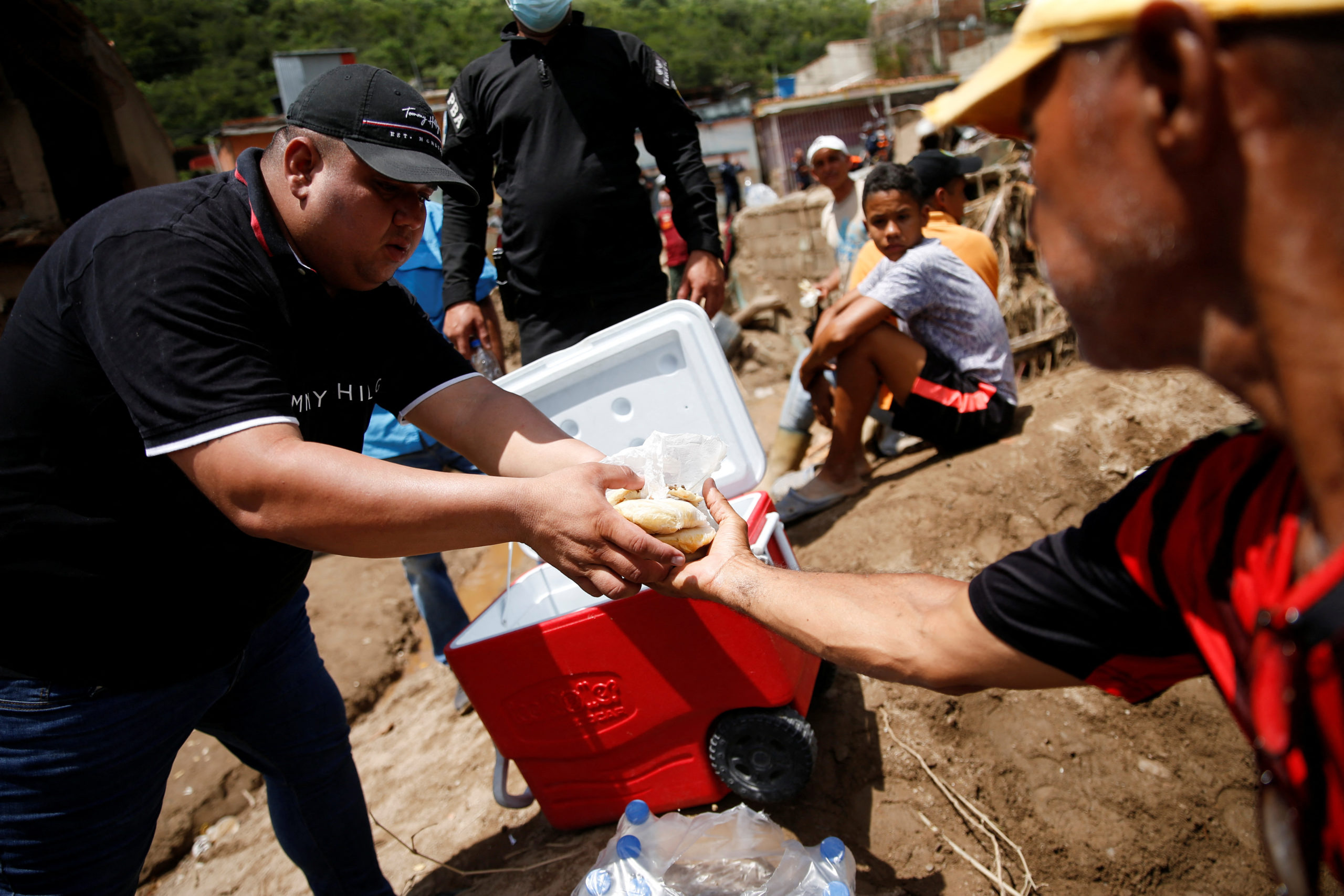 Hundreds search for signs of relatives following Venezuela floods ...