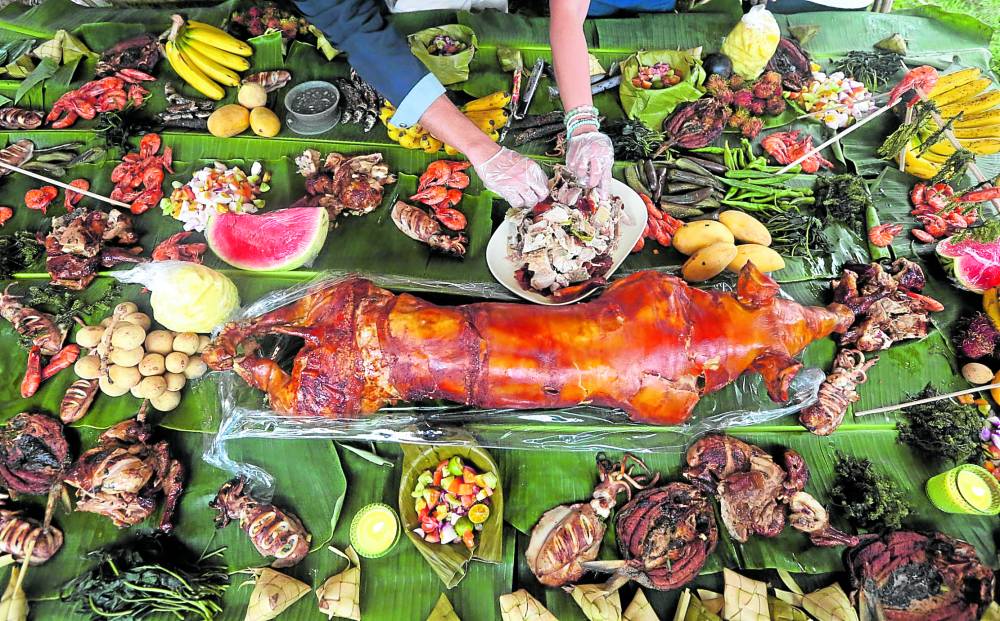 Transport of ‘lechon’, cooked pork out of Carcar okay despite ASF ...