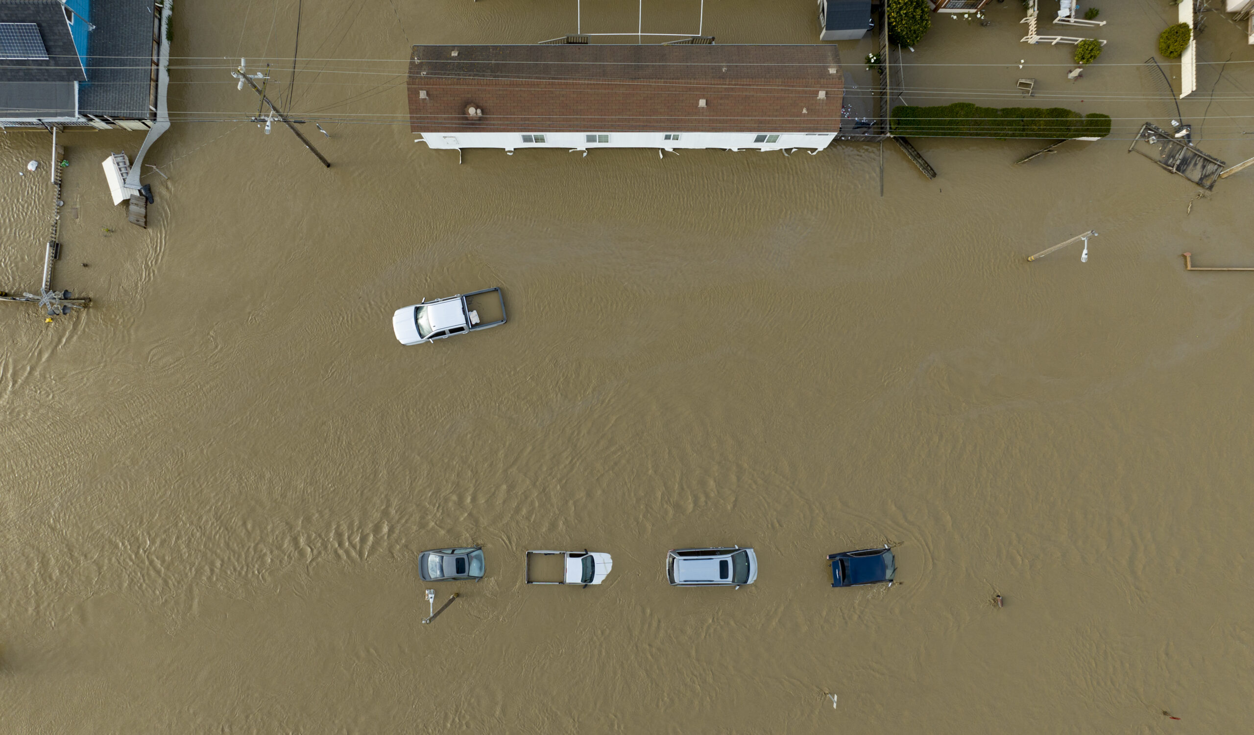 Latest California storm leaves at least two dead, breaks levee ...