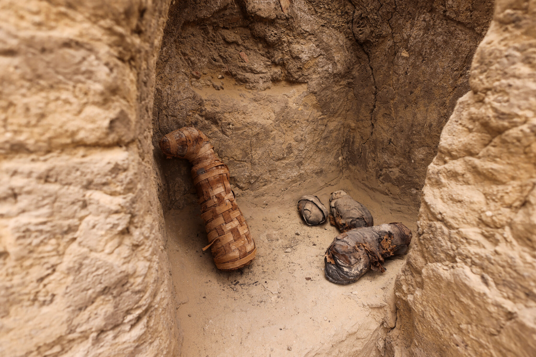 Egypt unearths mummification workshops, tombs in ancient burial ground ...