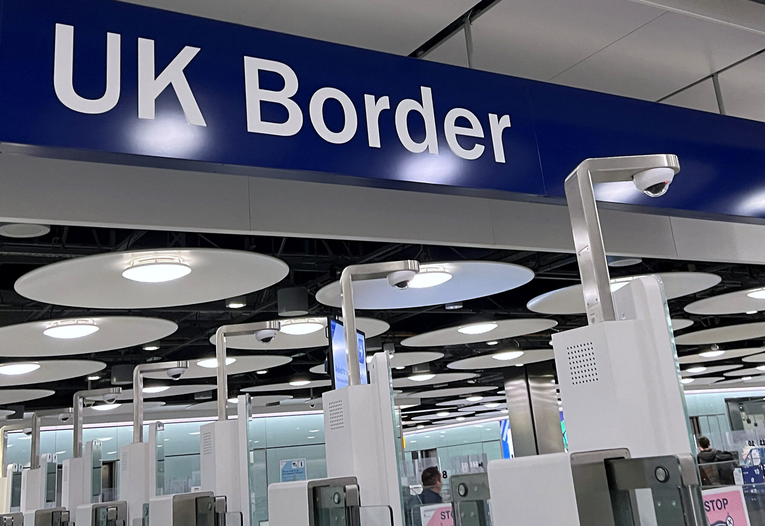 Britain says border e-gates back in service after outage sparked delays ...