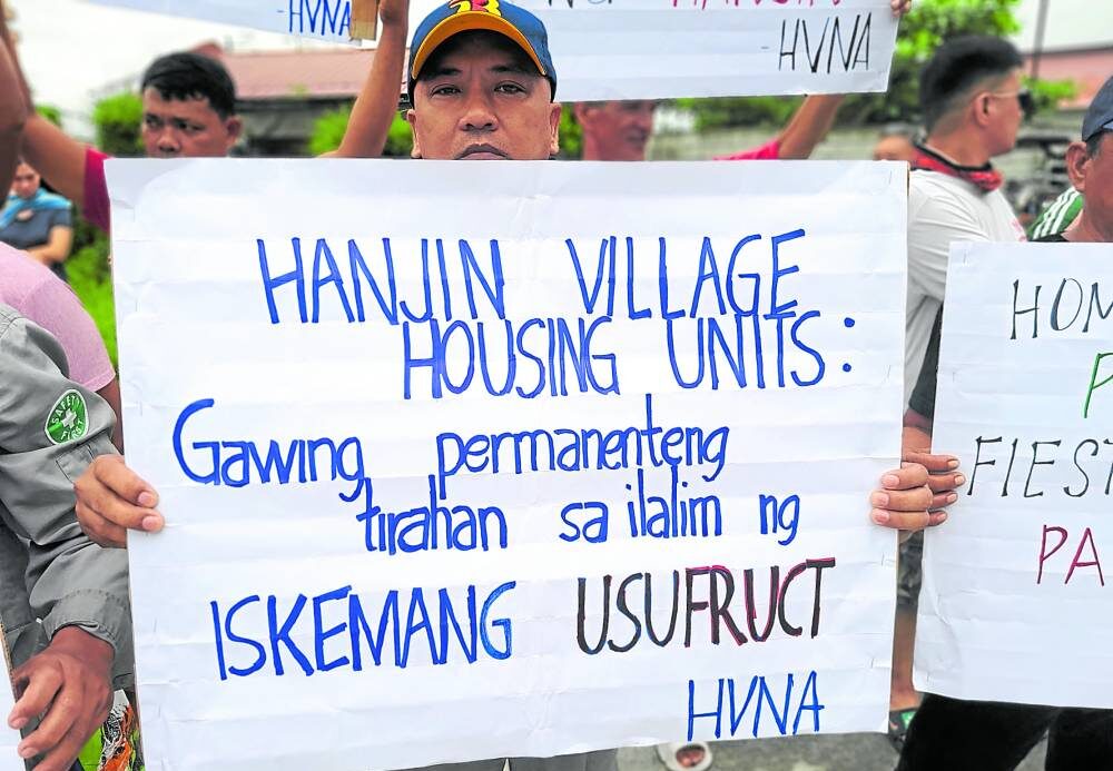 Ex-Hanjin workers fight eviction from houses | Inquirer News