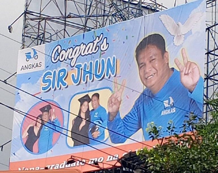 Angkas recognizes biker's achievements with large billboard