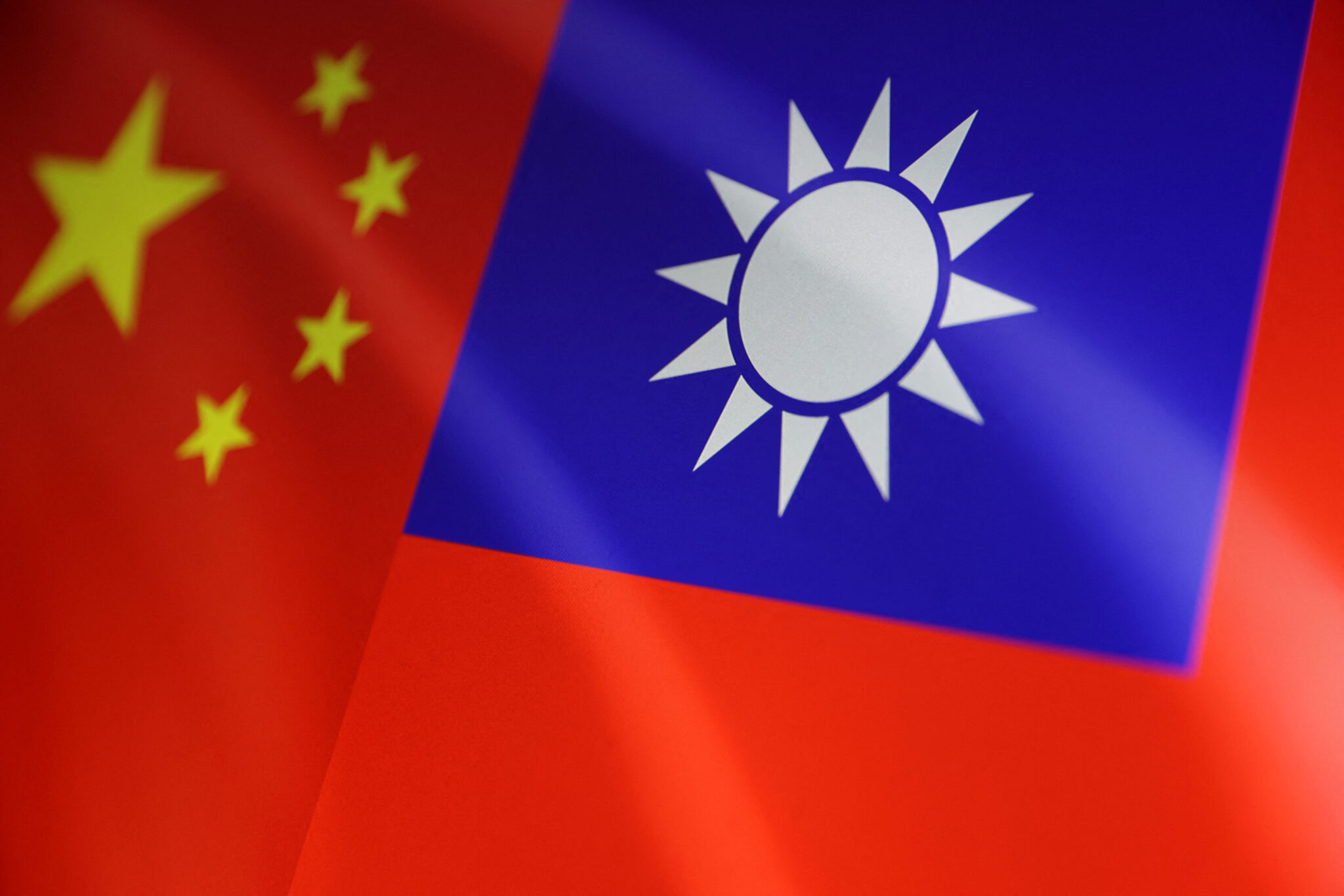 China calls on Taiwan people to promote 'peaceful reunification'