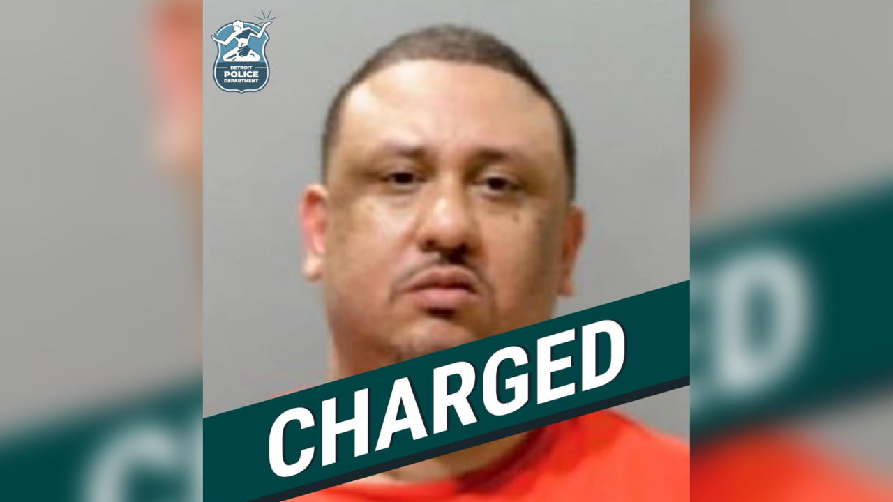 Detroit couple charged in death of man mauled by their 3 dogs