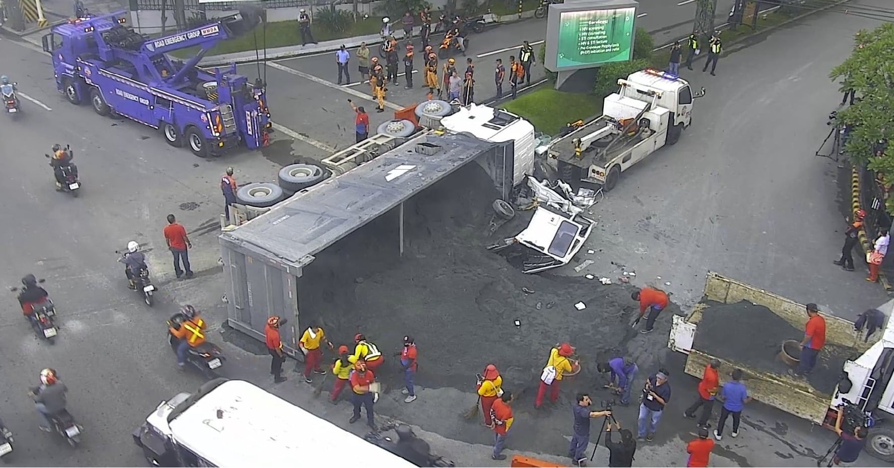 Road mishap involving sand-loaded truck hurts 8 in Quezon City