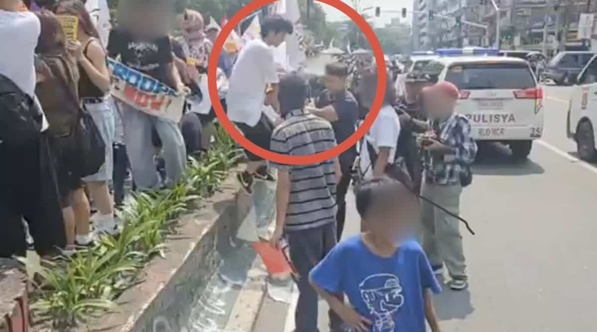 Protester sprays paint on undercover cop in Manila rally